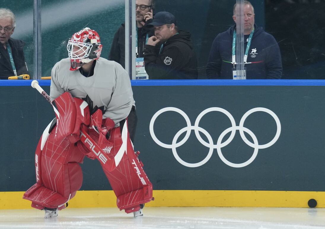 Olympic ice surface length less than 197 feet compared to NHL length of 200